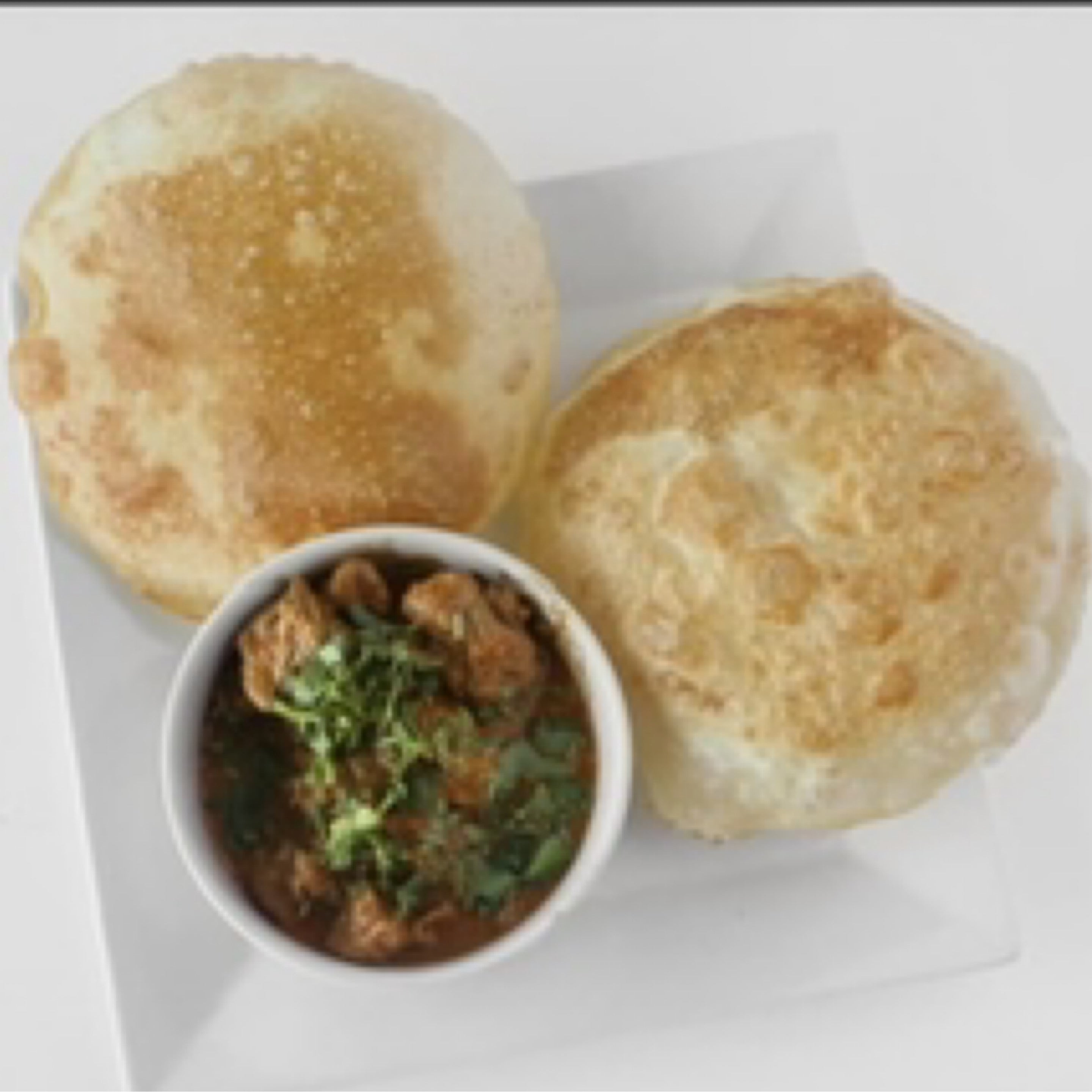 Puri(2) with Andhra Chicken Curry | Andhra Cafe Inc